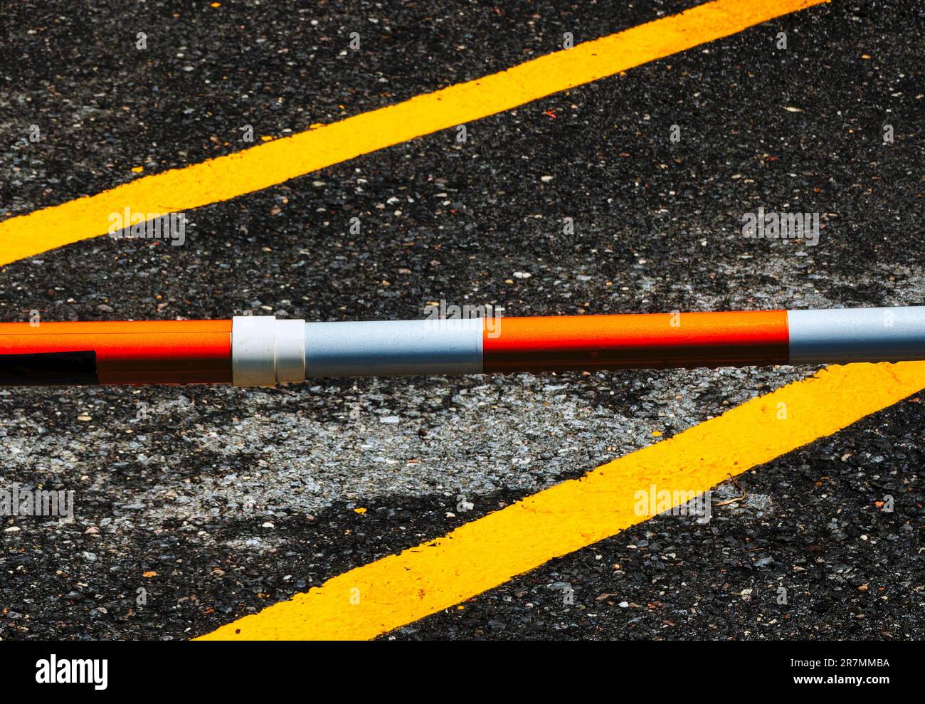 Painting on a road work site Stock Photo - Alamy
