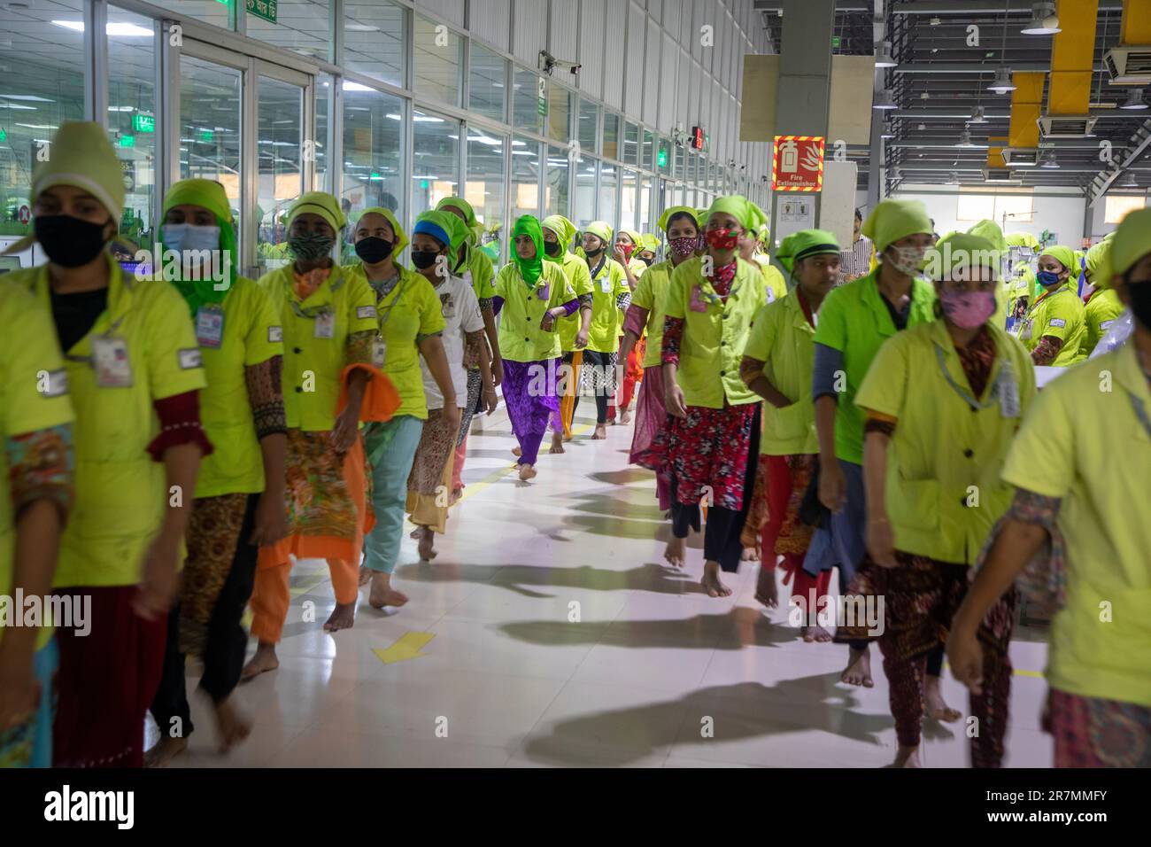 Ready-made garments (RMG) workers come out for launch at a LEED ...