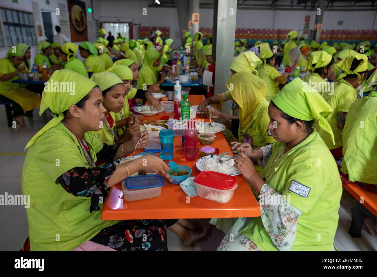 Ready-made garments (RMG) workers having lunch at the modern dining ...