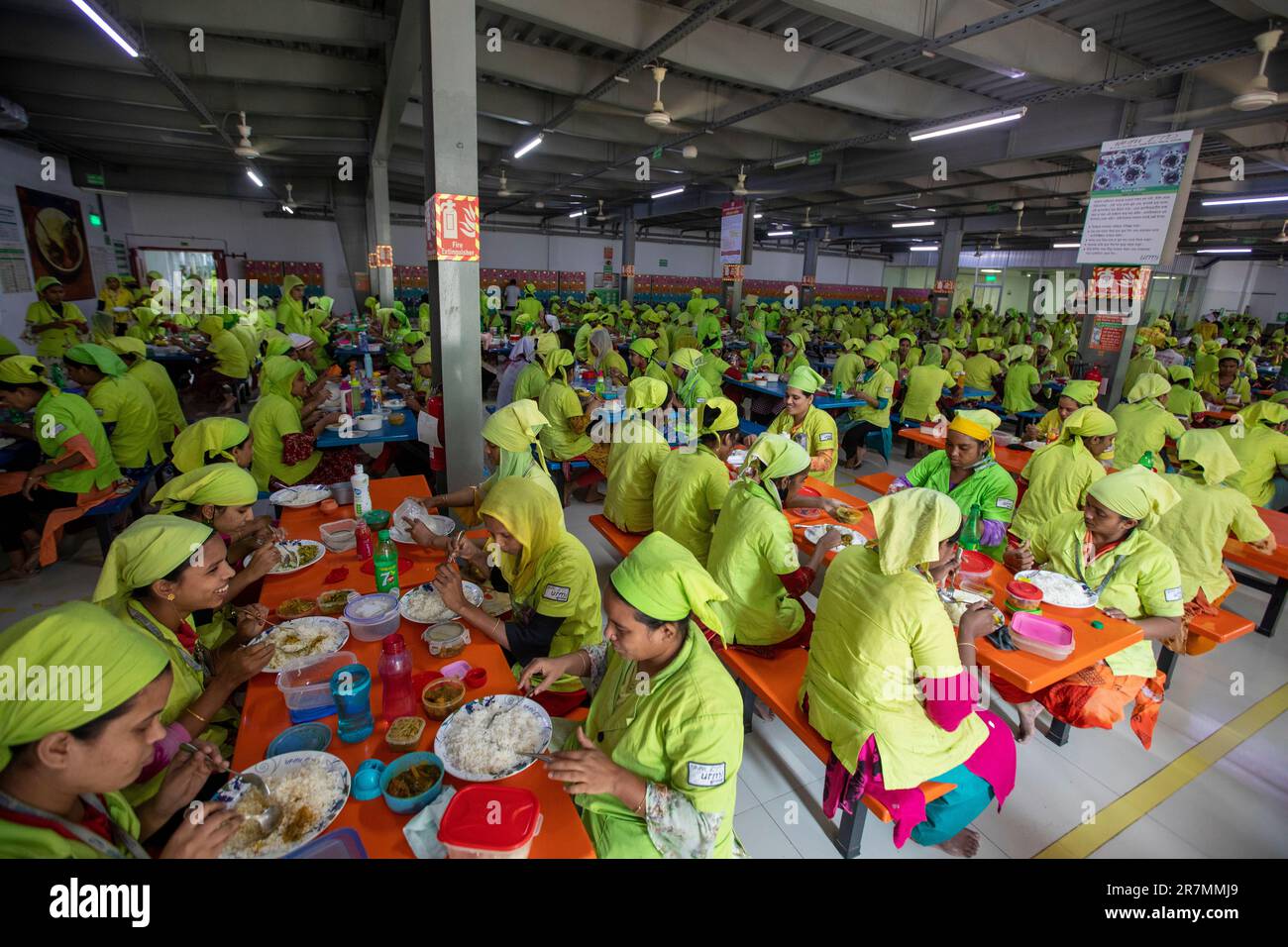Ready-made garments (RMG) workers having lunch at the modern dining ...