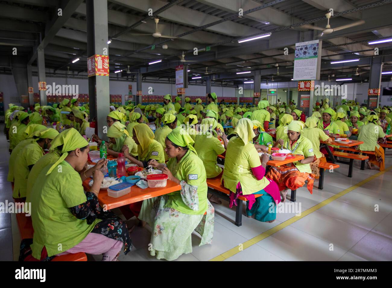 Ready-made garments (RMG) workers having lunch at the modern dining ...