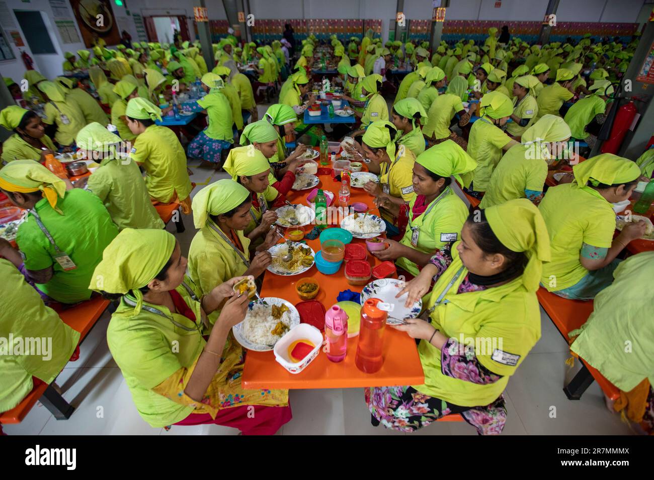 Ready-made garments (RMG) workers having lunch at the modern dining ...