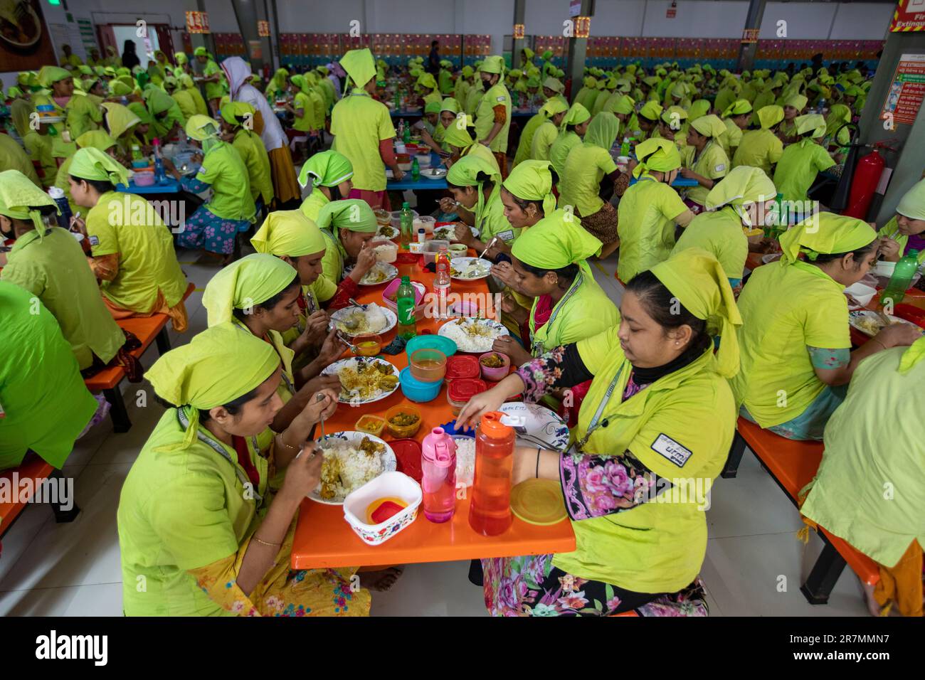 Ready-made garments (RMG) workers having lunch at the modern dining ...