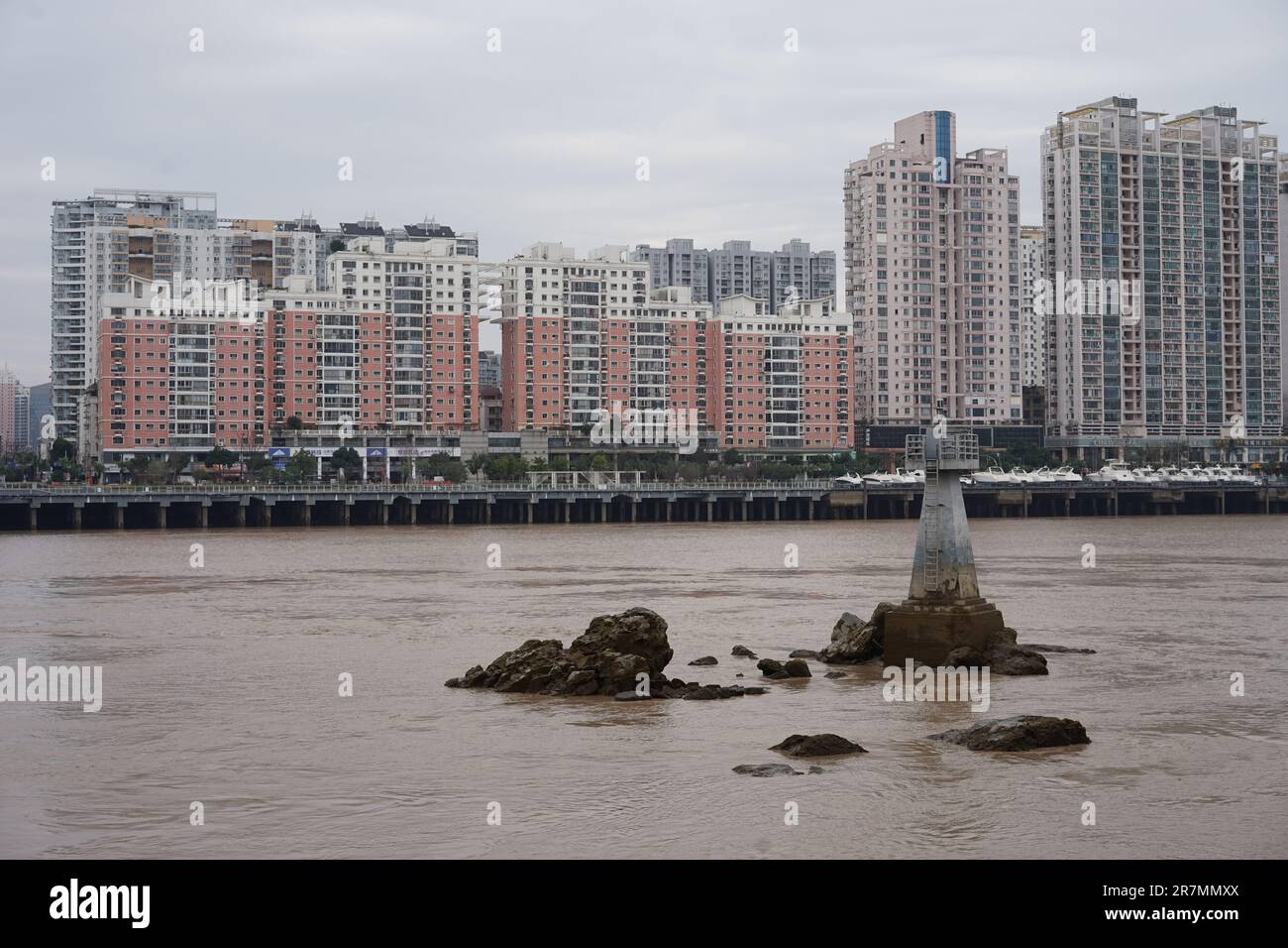 A scenic view of a city skyline with tall buildings stretching up ...