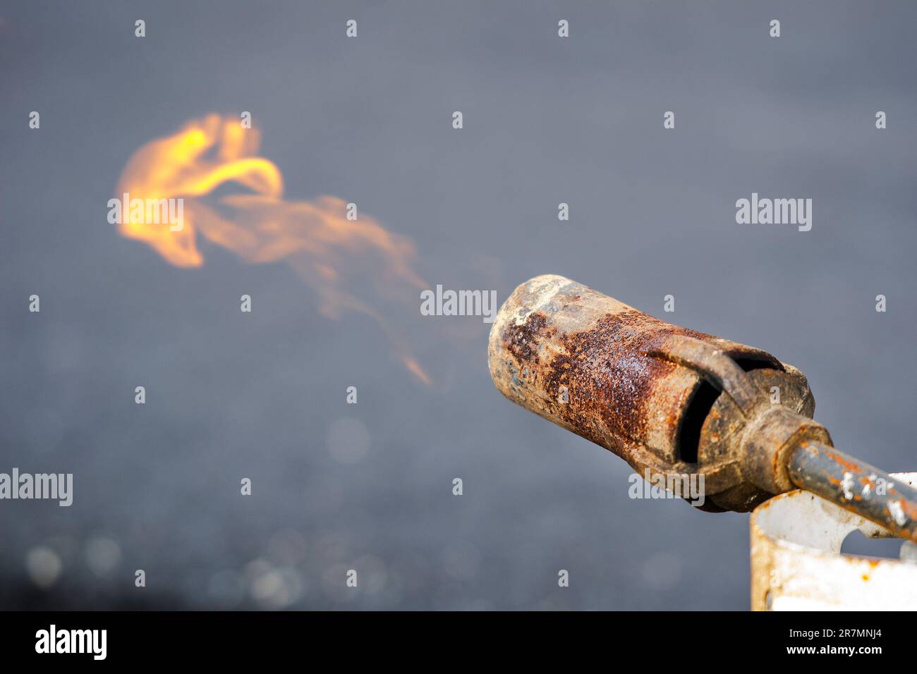 Image of blowtorch, construction activity Stock Photo - Alamy