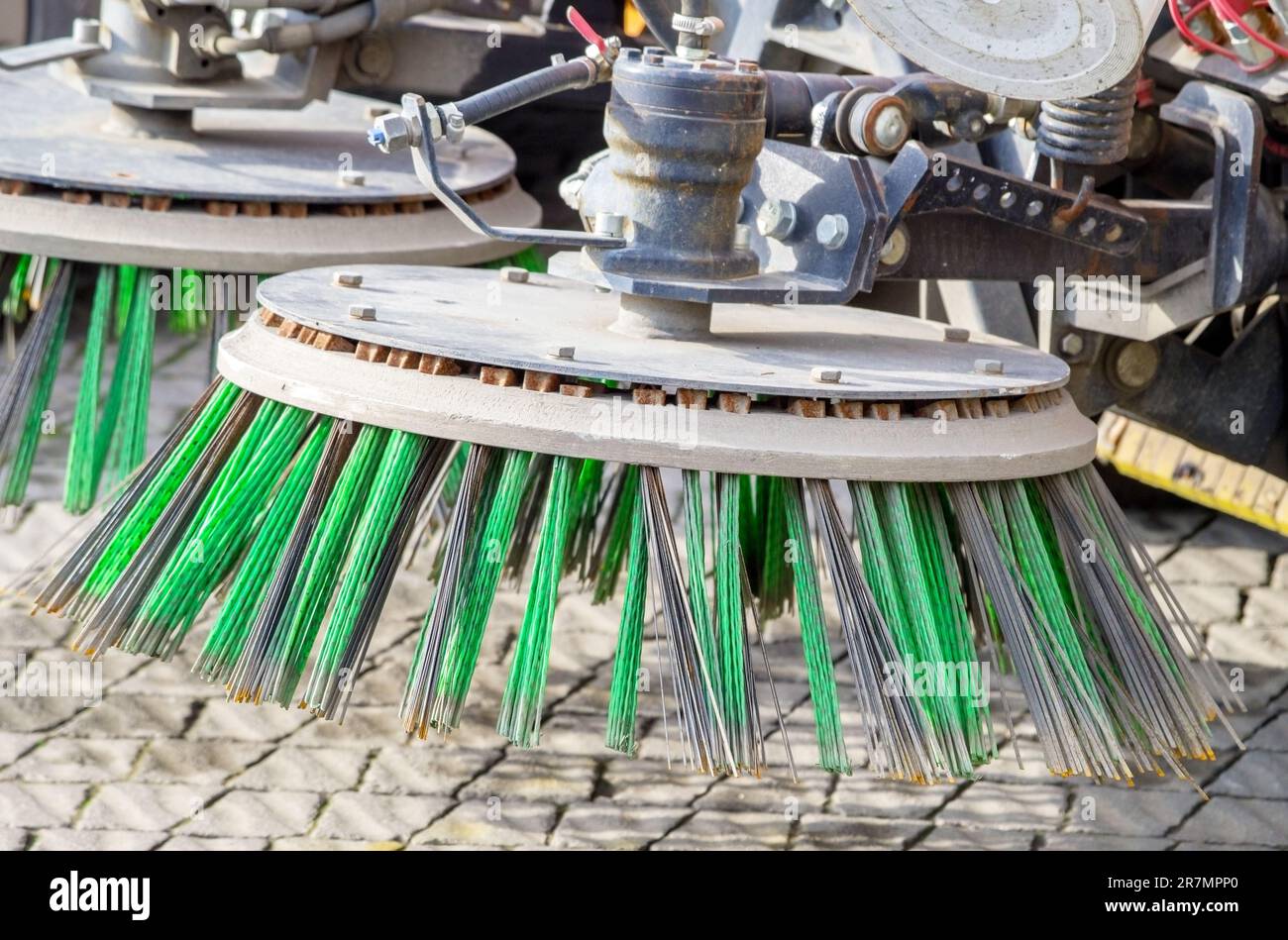 Street cleaning machine gathers trash, garbage and leaves Stock Photo ...