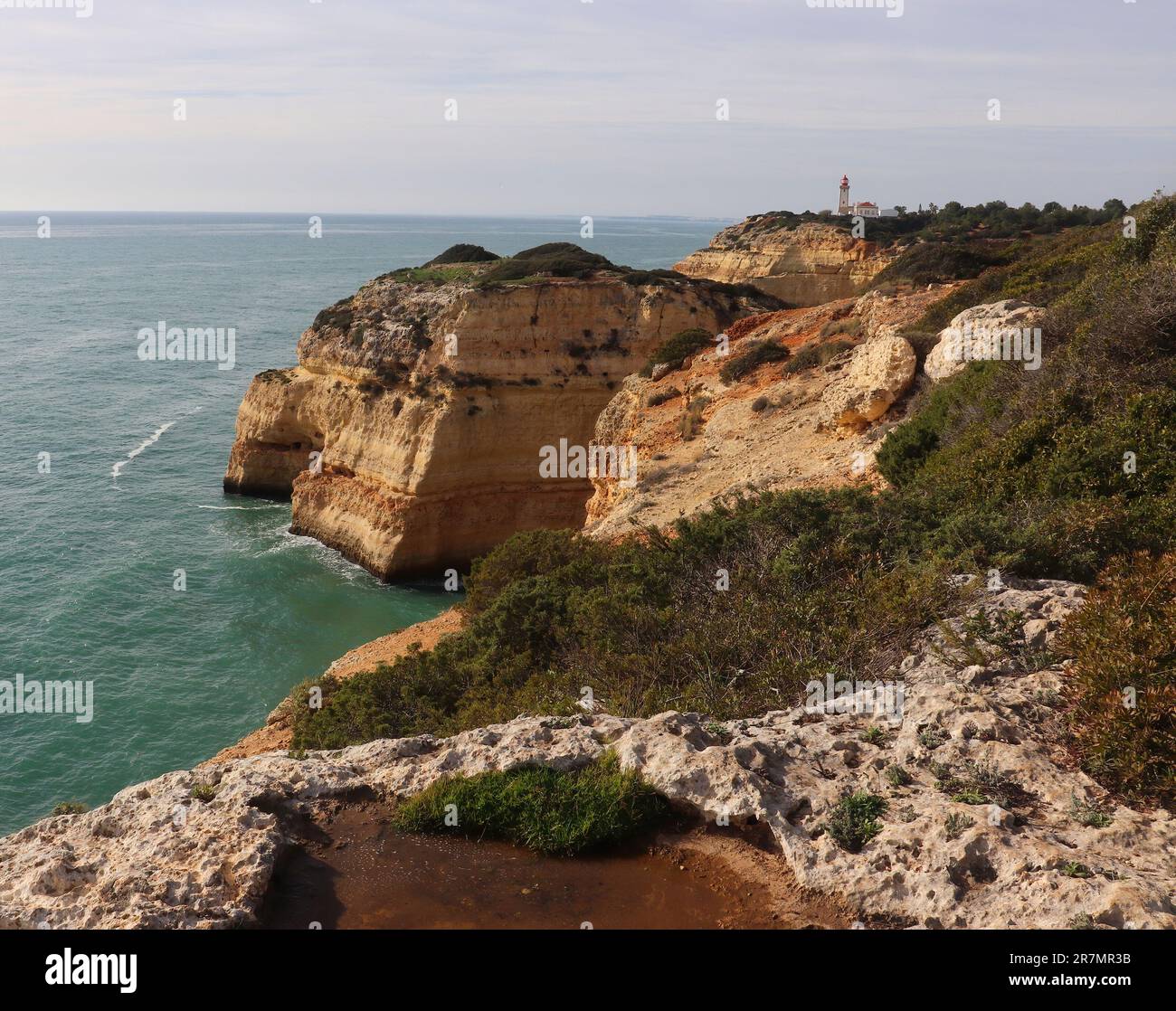 Carvoeiro, Portugal - December 25, 2019: Rocks and bushes on limestone ...