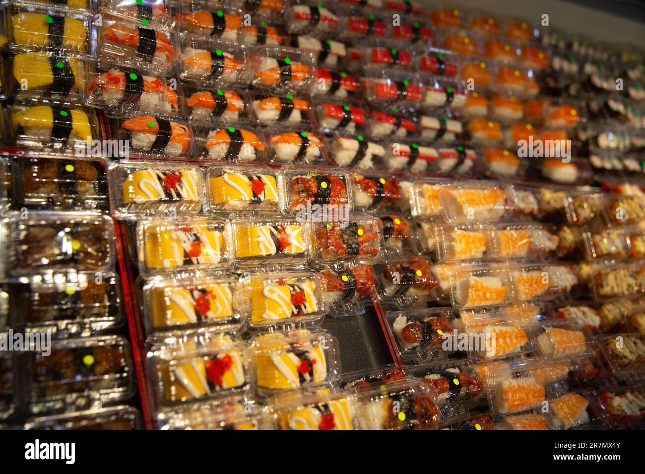 Variety of Mini sushi on display to buy Stock Photo - Alamy