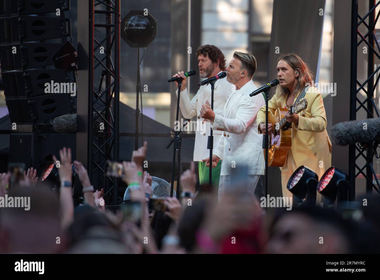 Gary Barlow, Mark Owen and Howard Donald perform on stage during Take ...