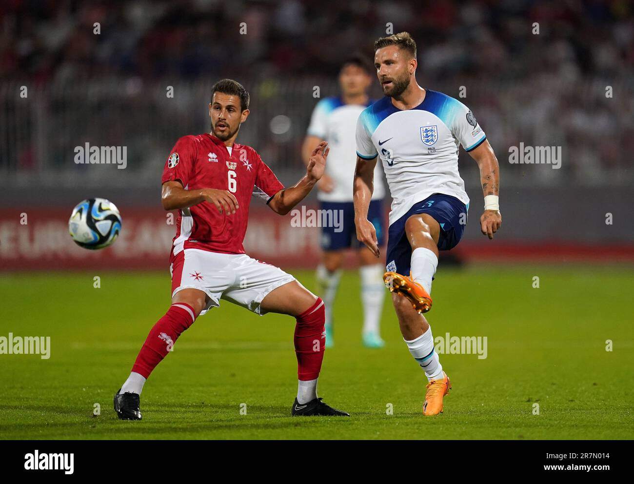 Malta's Matthew Guillaumier (left) and England's Luke Shaw battle for ...