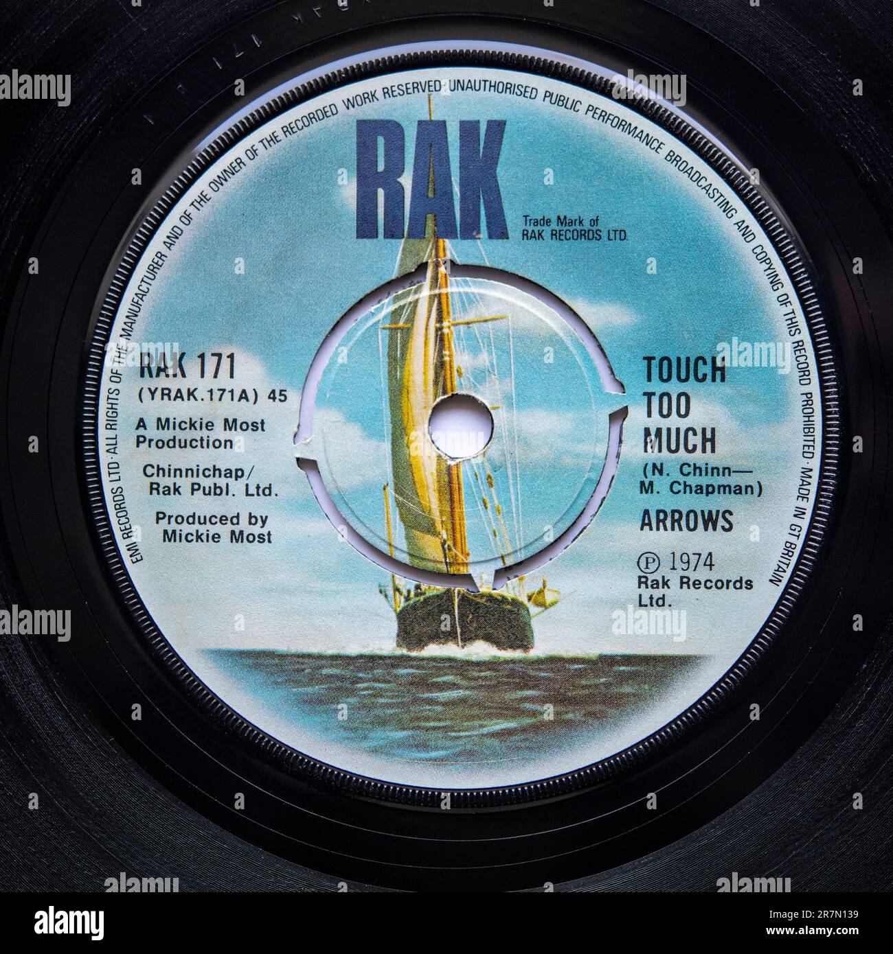 Centre label of the seven inch single version of Touch Too Much by ...