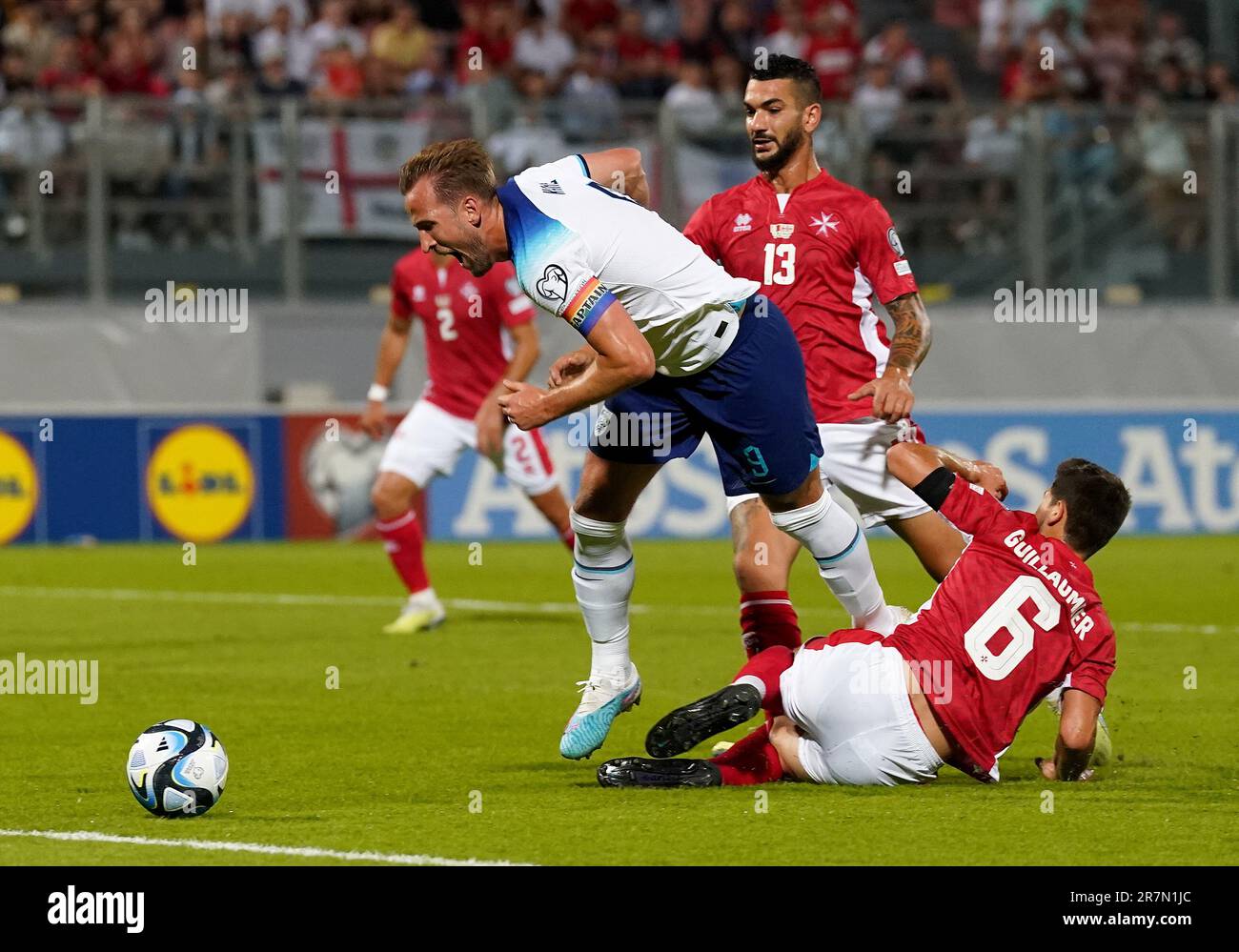 England's Harry Kane is fouled by Malta's Matthew Guillaumier resulting ...