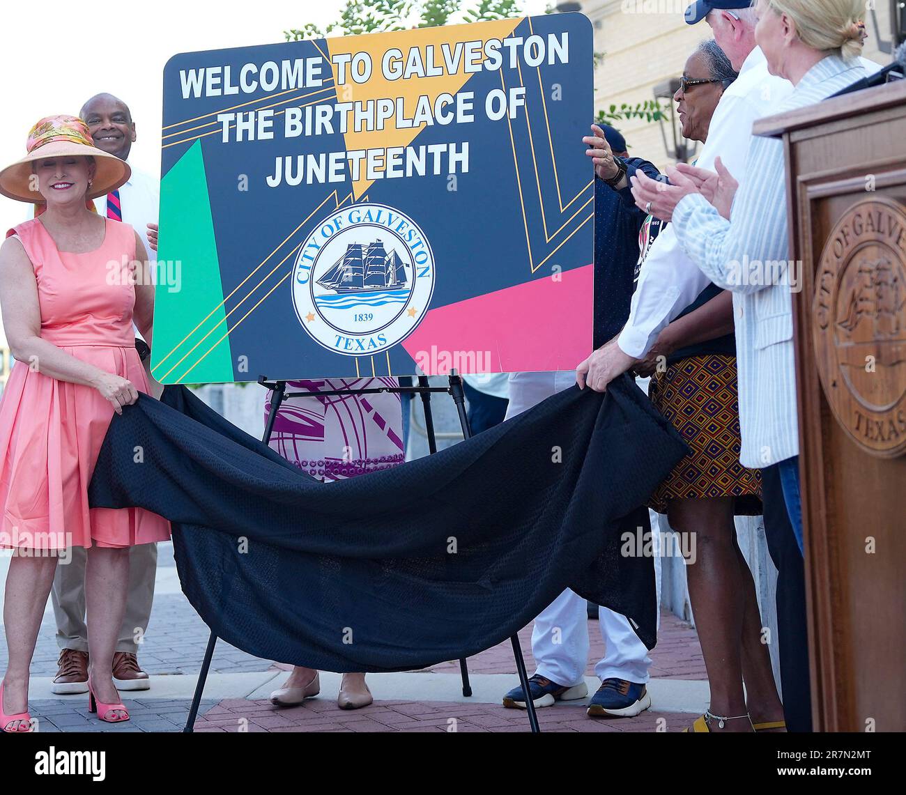 Members of the City of Galveston government unveil new signage that ...