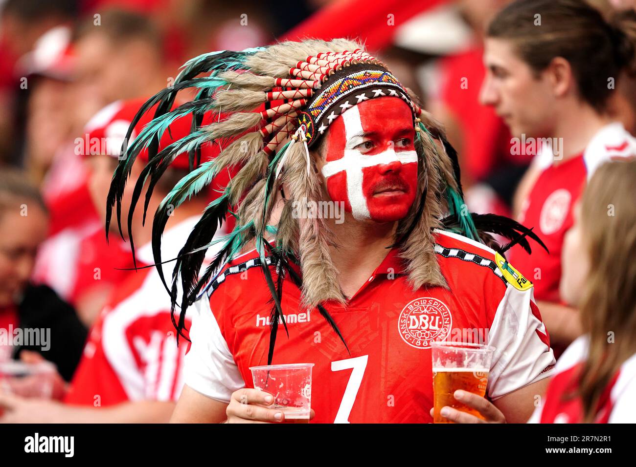 A Denmark fan wearing a headdress and facepaint before the UEFA Euro ...