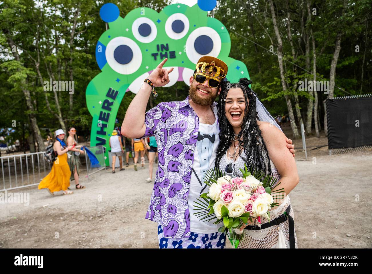 John Cronk, left, and Amanda Cronk, two festivalgoers who married at ...