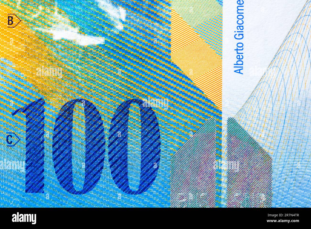 Selective focus on detail of CHF banknotes. Close up macro detail of ...