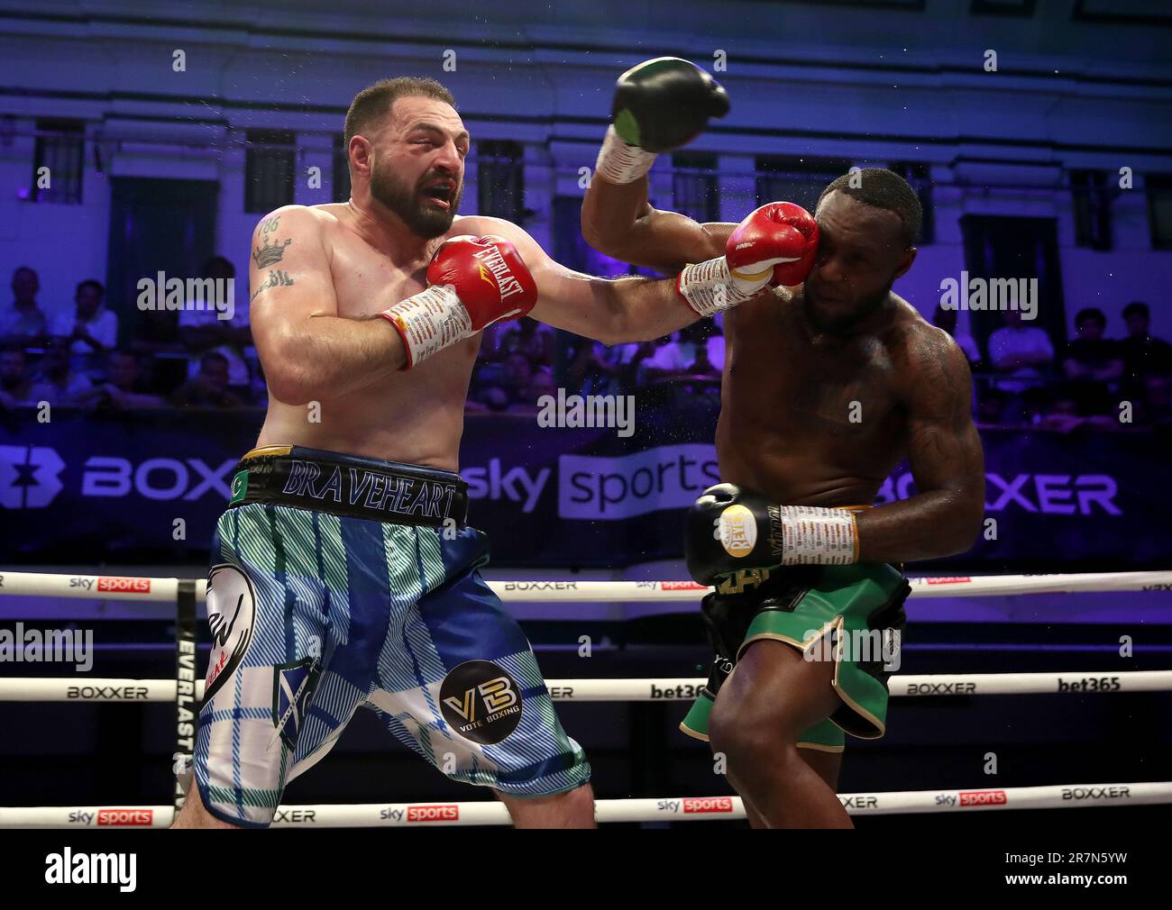 Anees Taj (left) and Viddal Riley in action during their Cruiserwight ...