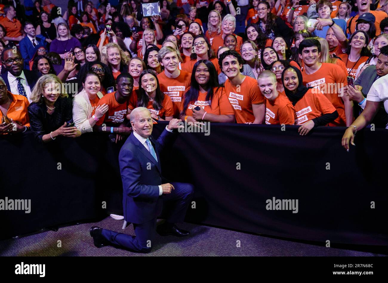 President Joe Biden poses for a photo with the Students Demand Action ...