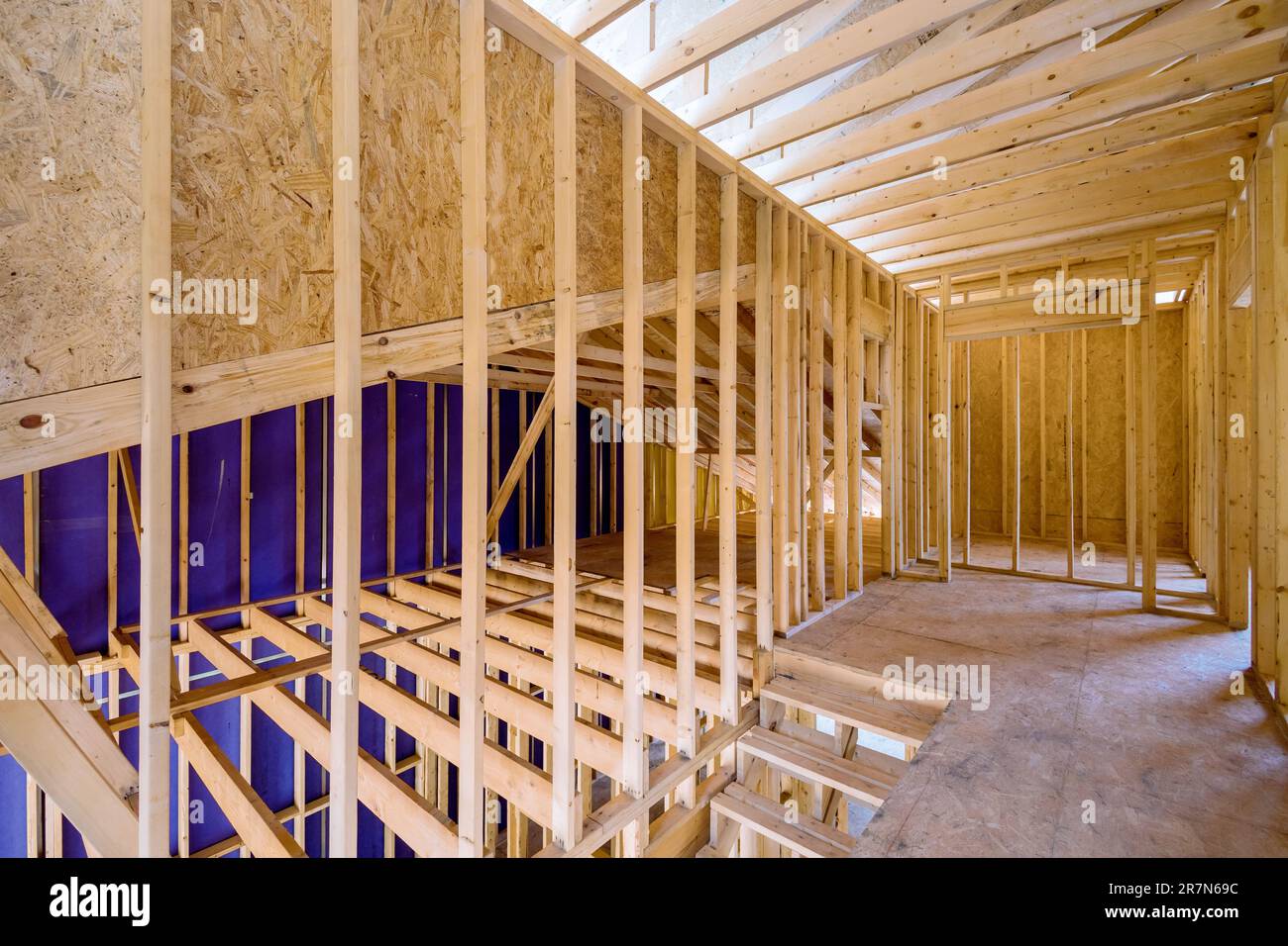 View inside new house under construction showing incomplete wooden home ...