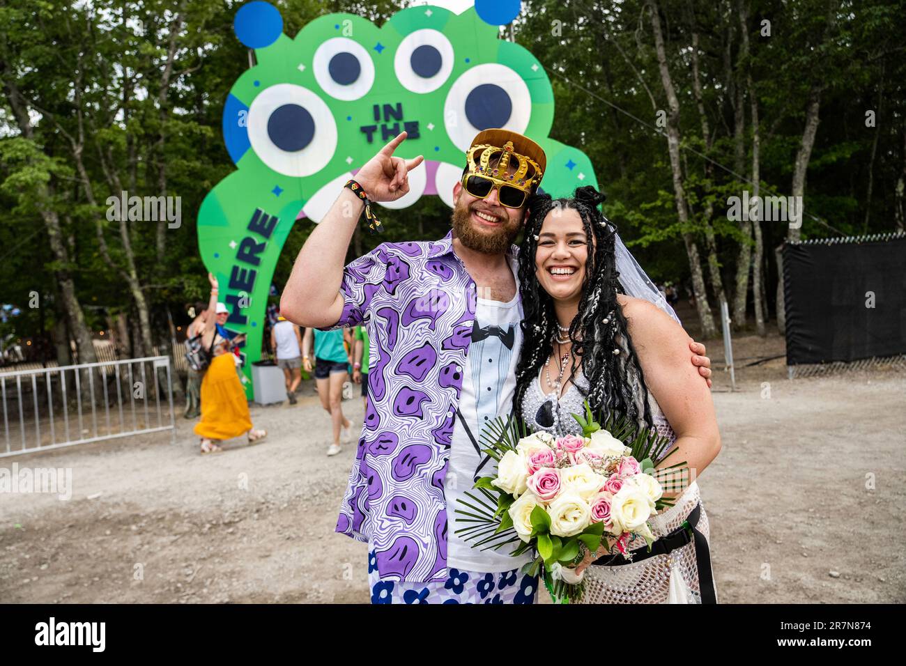 John Cronk, left, and Amanda Cronk, two festivalgoers who married at ...