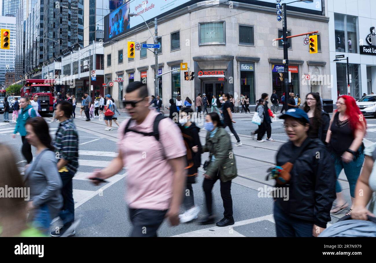 Toronto, Canada. 16th June, 2023. People walk on a street in Toronto ...