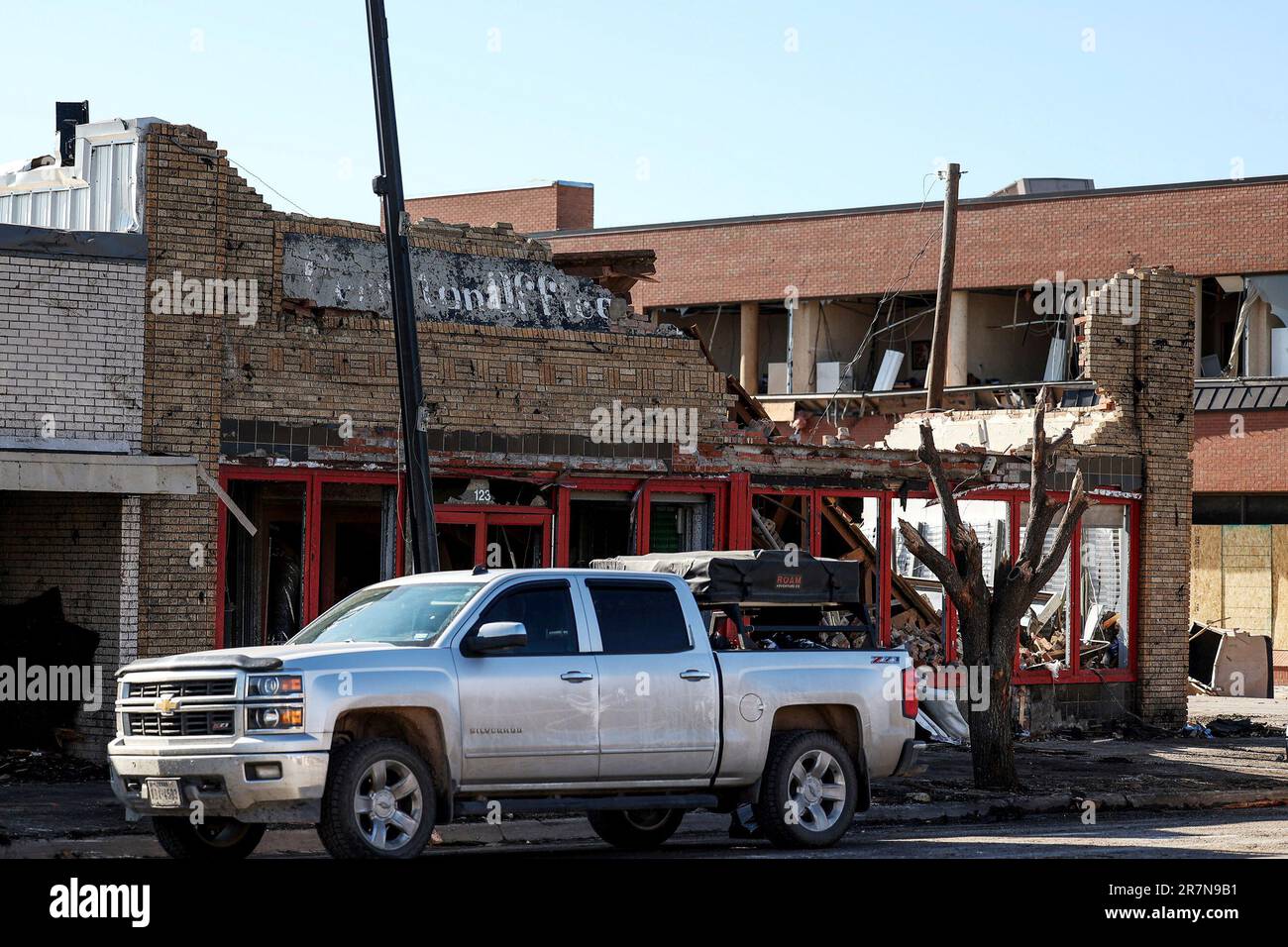 Buildings in downtown Perryton, Texas, Friday, June, 16, 2023, reflect ...