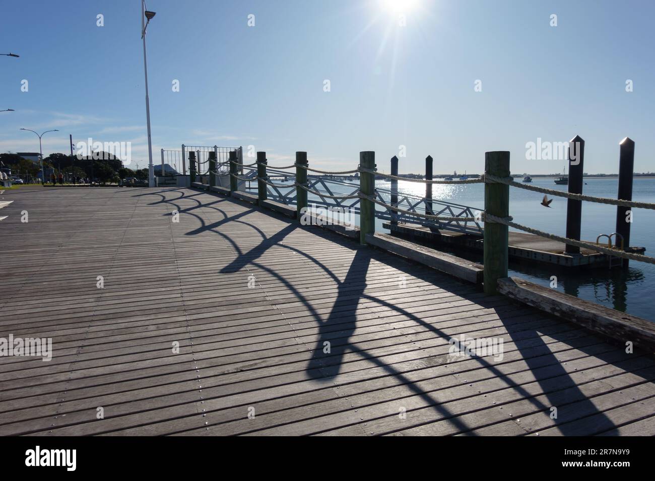 Shadow patterns of rope and post bollards along Tauranga City ...