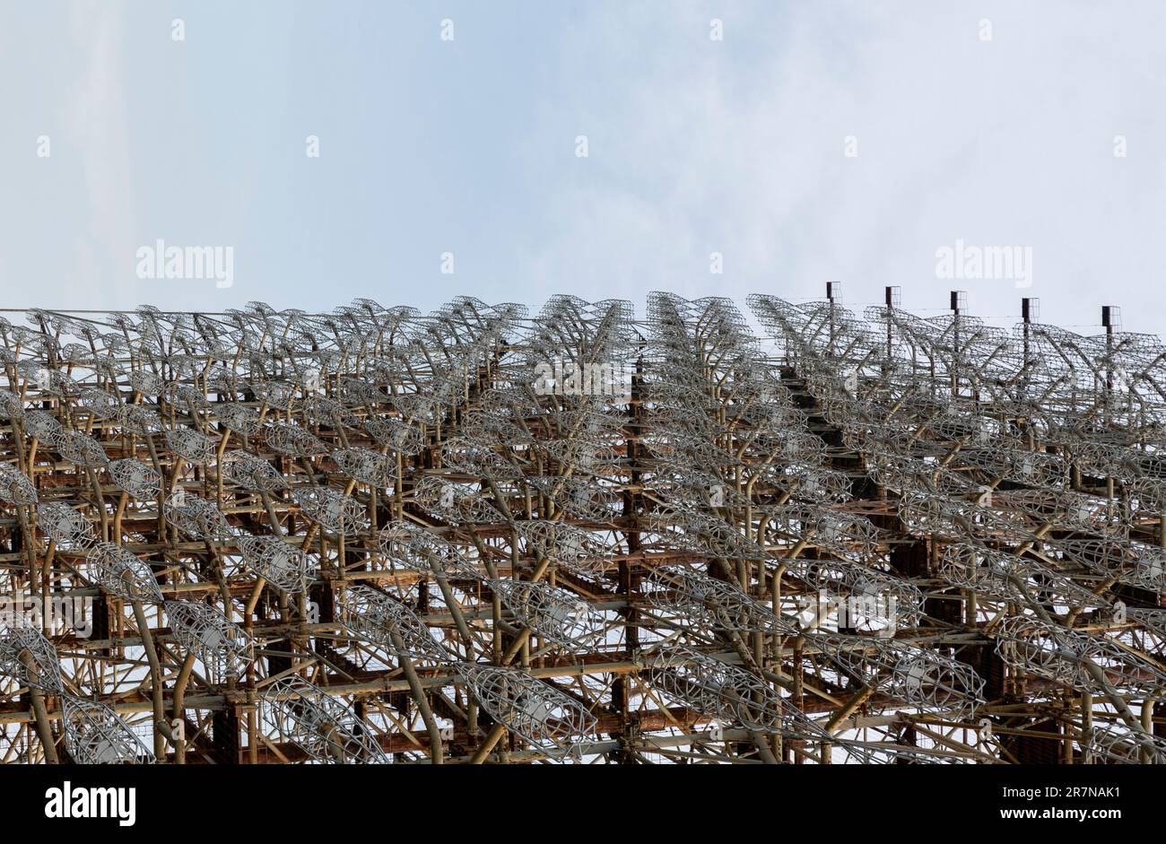 The Duga Radar under a blue cloudy sky in an abandoned area in ...