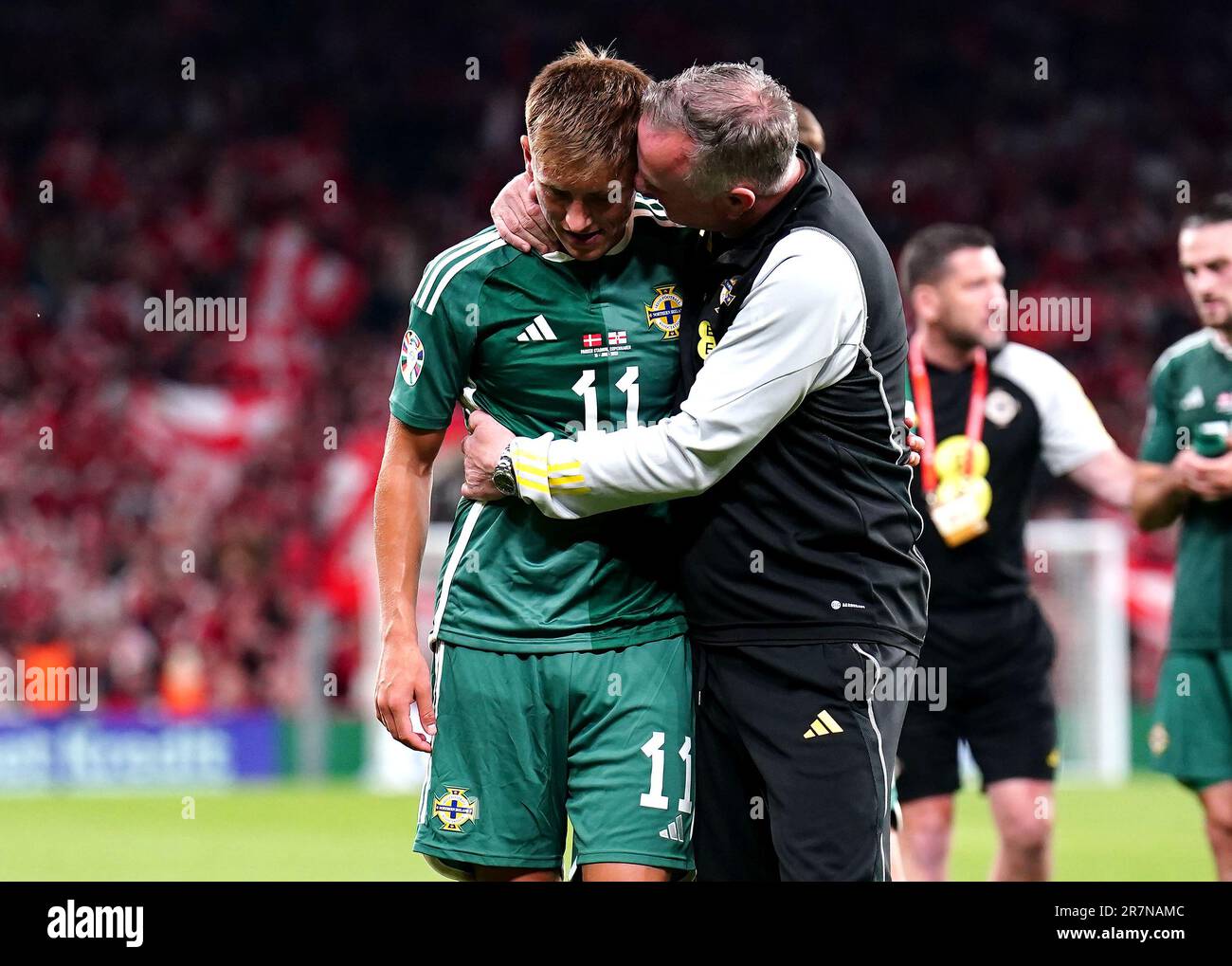 Northern Ireland's Callum Marshall looks dejected as head coach Michael ...