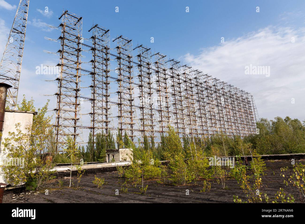 The Duga Radar under a blue cloudy sky in an abandoned area in ...