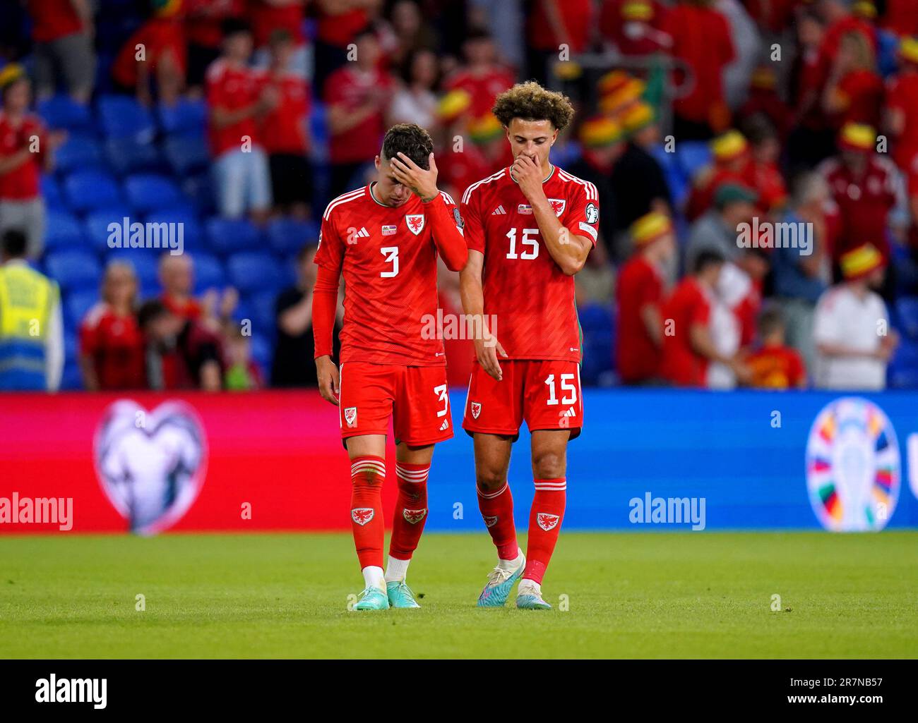 Wales' Neco Williams (left) and Ethan Ampadu appear dejected at the end ...