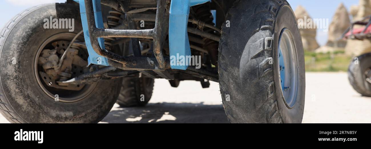 Old broken blue ATV in desert closeup Stock Photo - Alamy