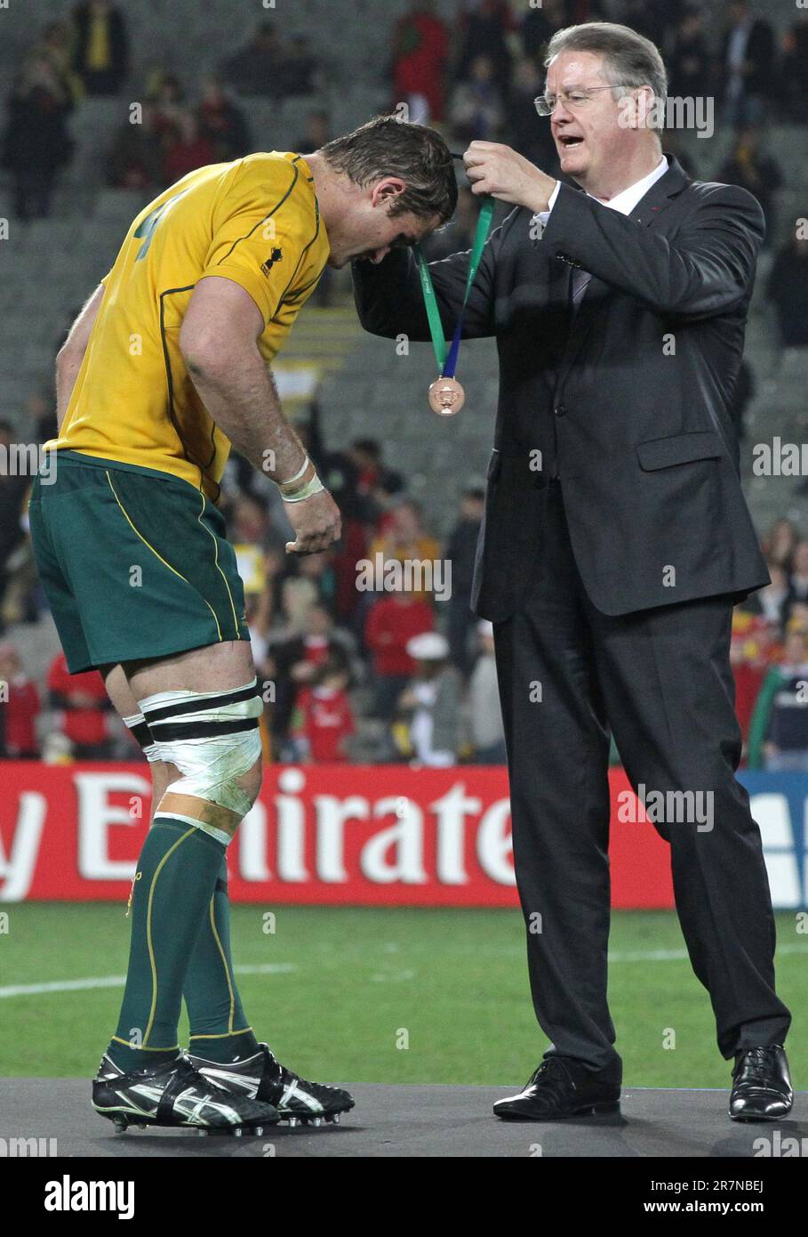 Australia’s captain James Horwill receives his bronze medal from IRB ...