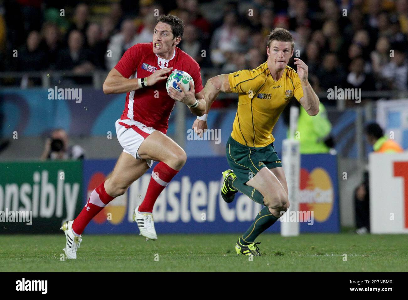 Wales James Hook is chased by Australia’s Robert Horne during the ...