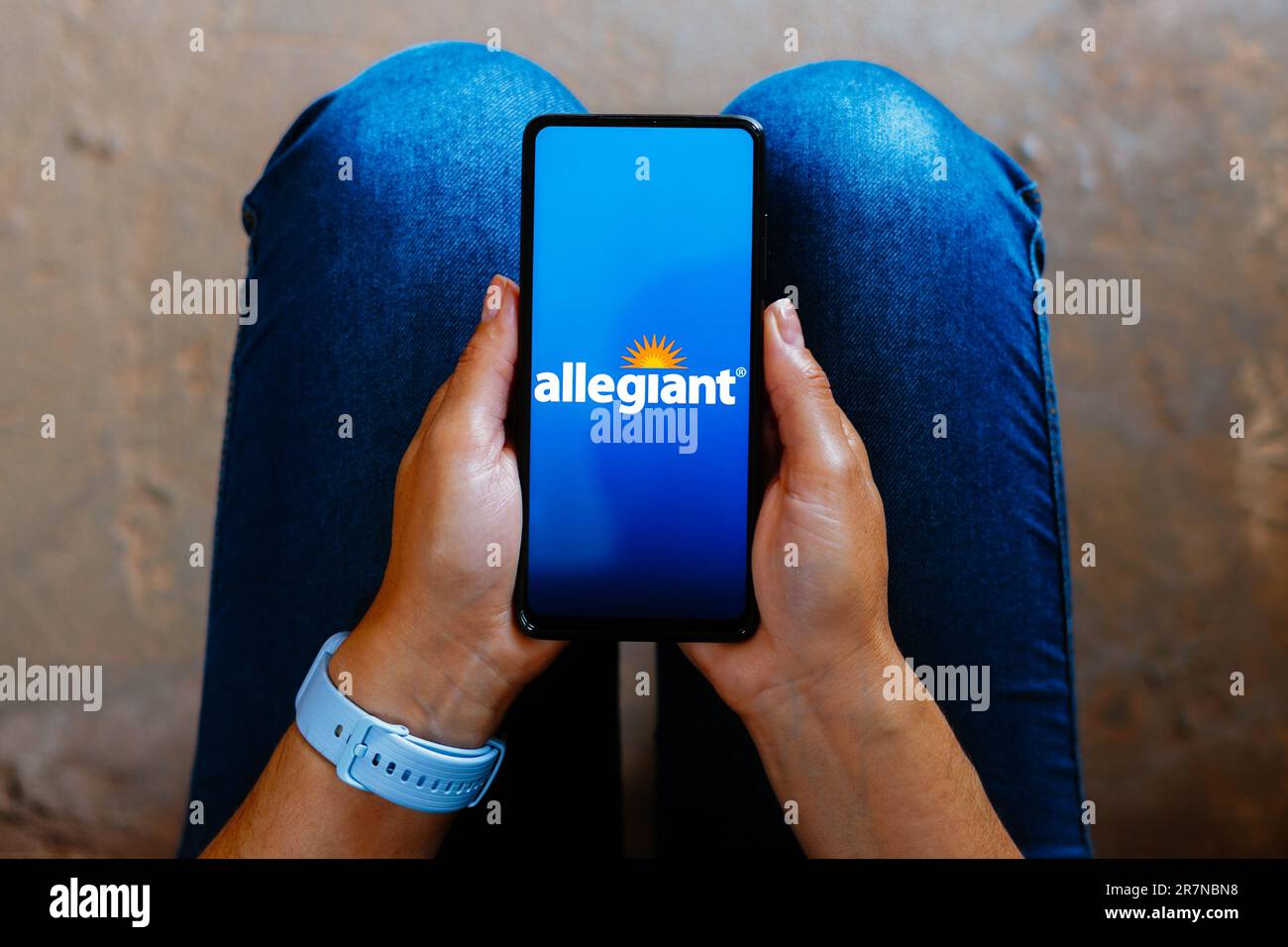 In this photo illustration, the Allegiant Air logo is displayed on a ...