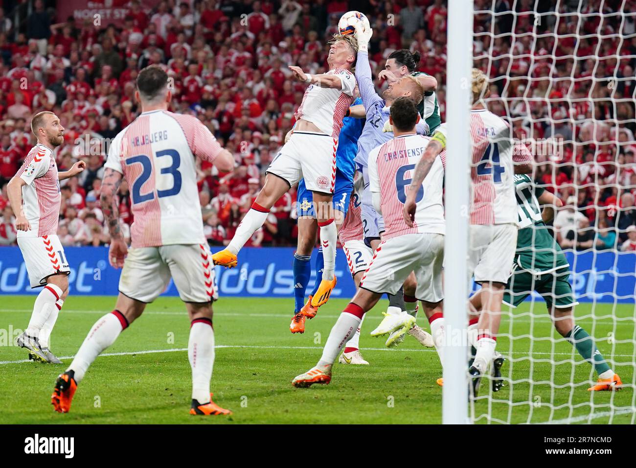 Denmark goalkeeper Kasper Schmeichel attempts to claim the ball from ...