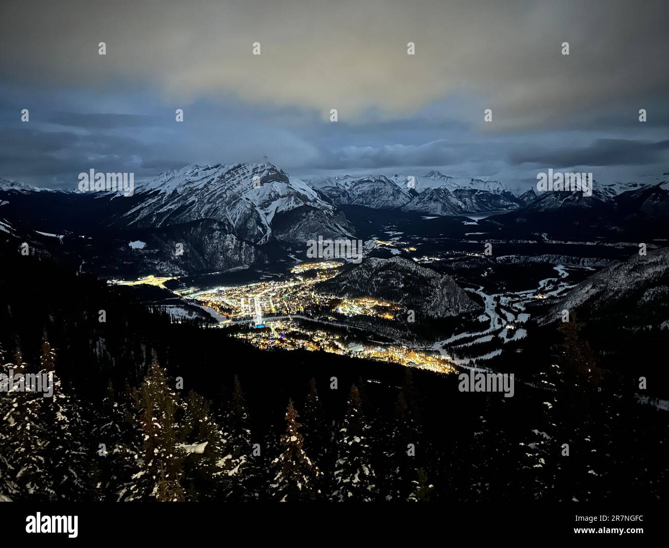 An aerial view of the Banff Village in Alberta, Canada at night ...