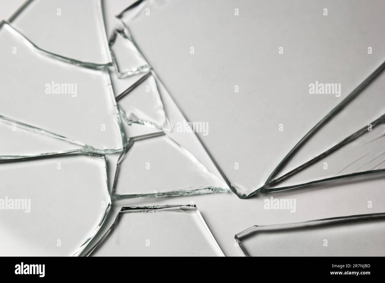Broken glass background for your images isolated on white. Many large ...