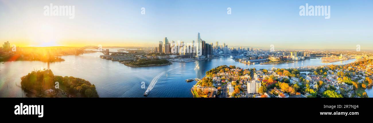 WIde aerial panorama in City of Sydney of harbour waterfront with major ...