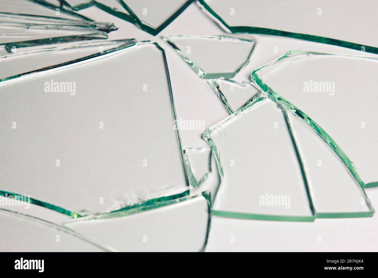 Broken glass pile pieces of texture and background isolated on white ...