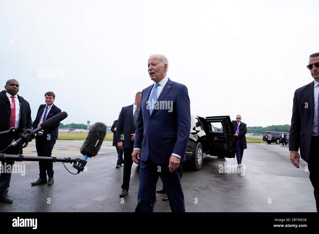 President Joe Biden walks to speak to members of the media after he ...