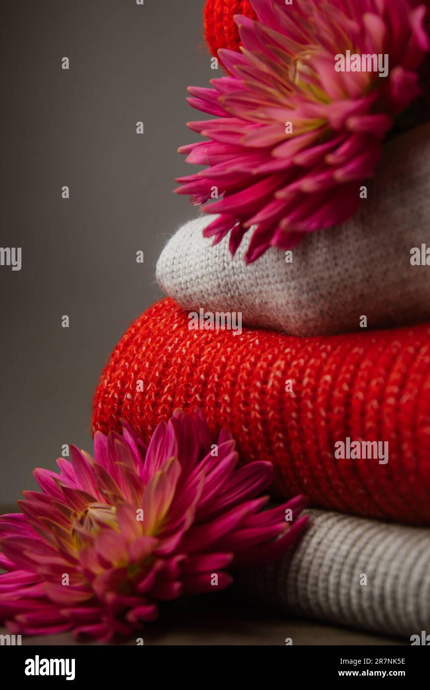 Pattern of colorful knitted sweaters closeup. Handmade merino wool ...