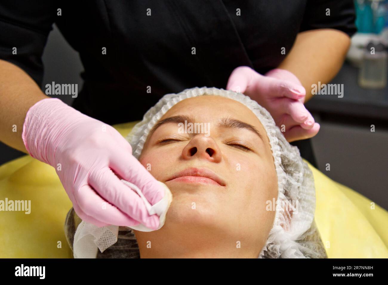 cosmetology concept. Close. Beautician hands cleaning and touching a ...