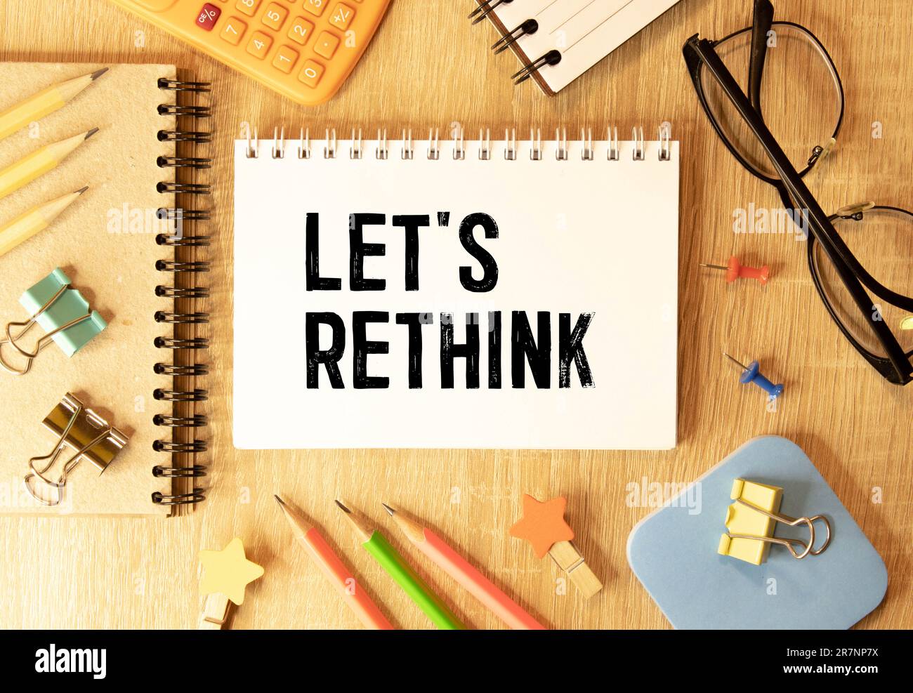 Let's Rethink text on notepad, concept background Stock Photo - Alamy