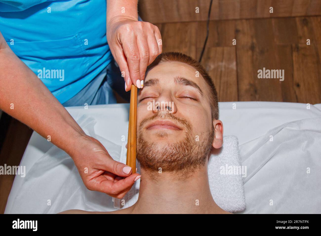 Wellness Concept Professional Masseur Gives A Man A Thai Facial