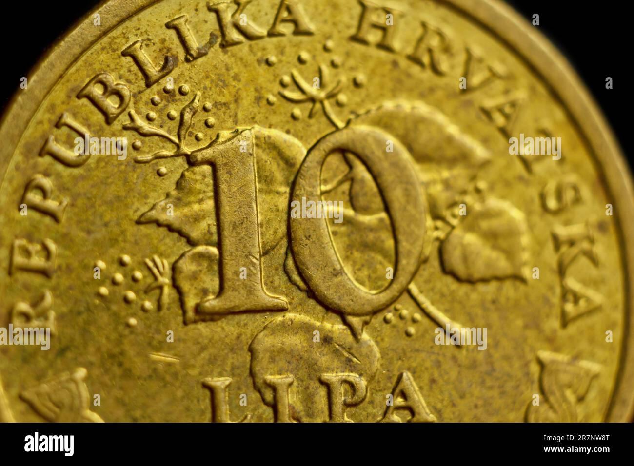 Coin ten Croatian lipa macro isolated on black background. Detail of ...