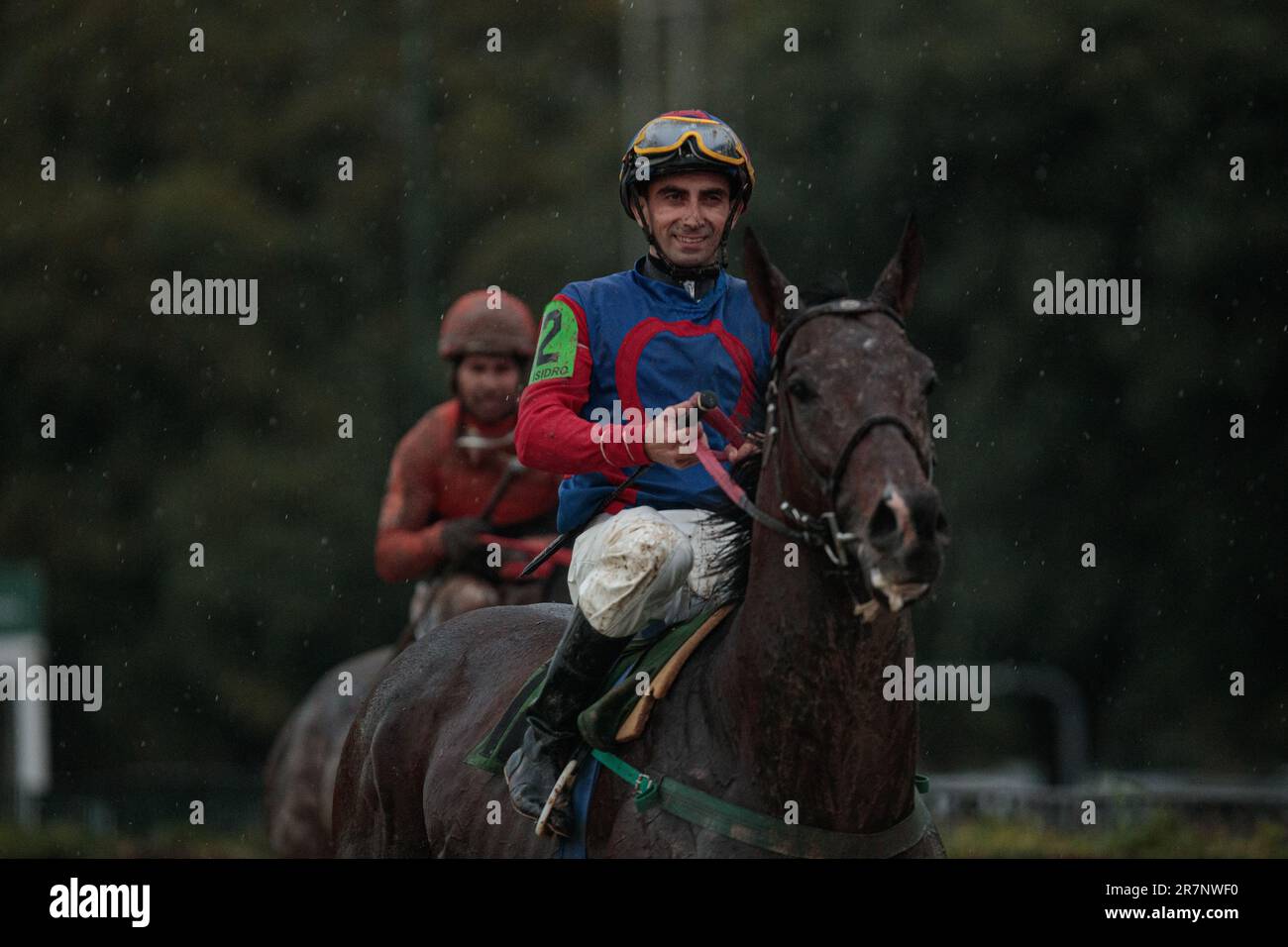 Racing silks on jockeys hi-res stock photography and images - Alamy