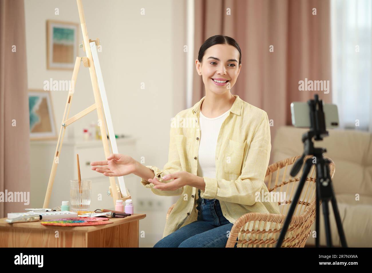 Teacher conducting online painting lesson at home. Time for hobby Stock ...