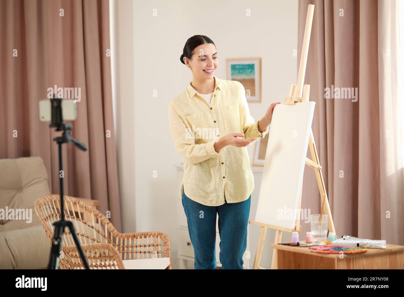 Teacher conducting online painting lesson at home. Time for hobby Stock ...