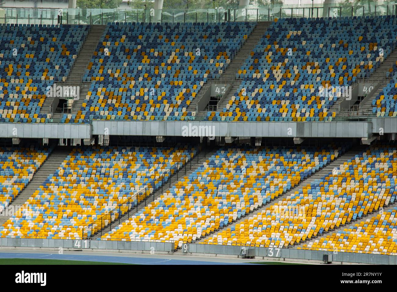 soccer stadium inside view. football field, empty stands, a crowd of ...